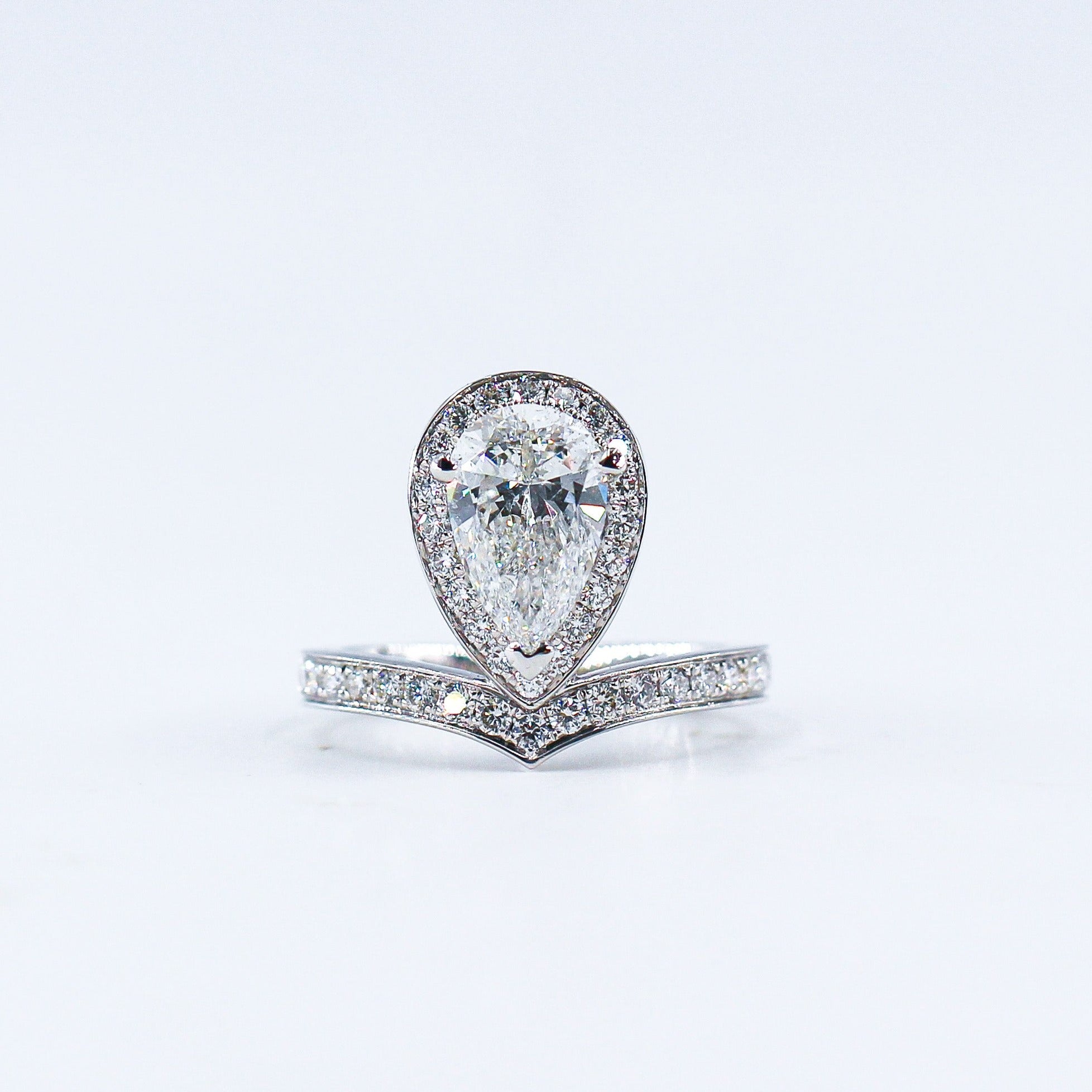 Pear Shape Diamond Halo and Wavy Style Shoulder Stone Engagement Ring ...